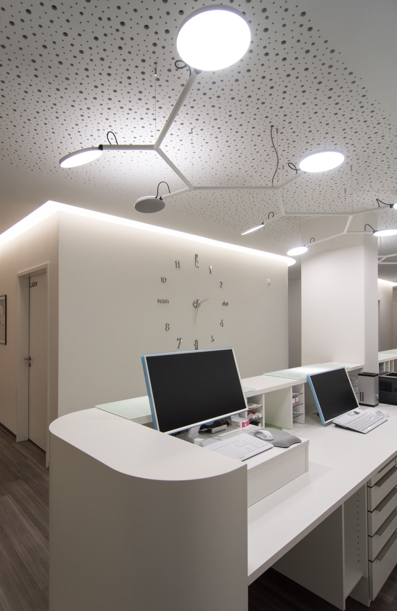 Lighting for reception desks – light for reception counters & desks ...